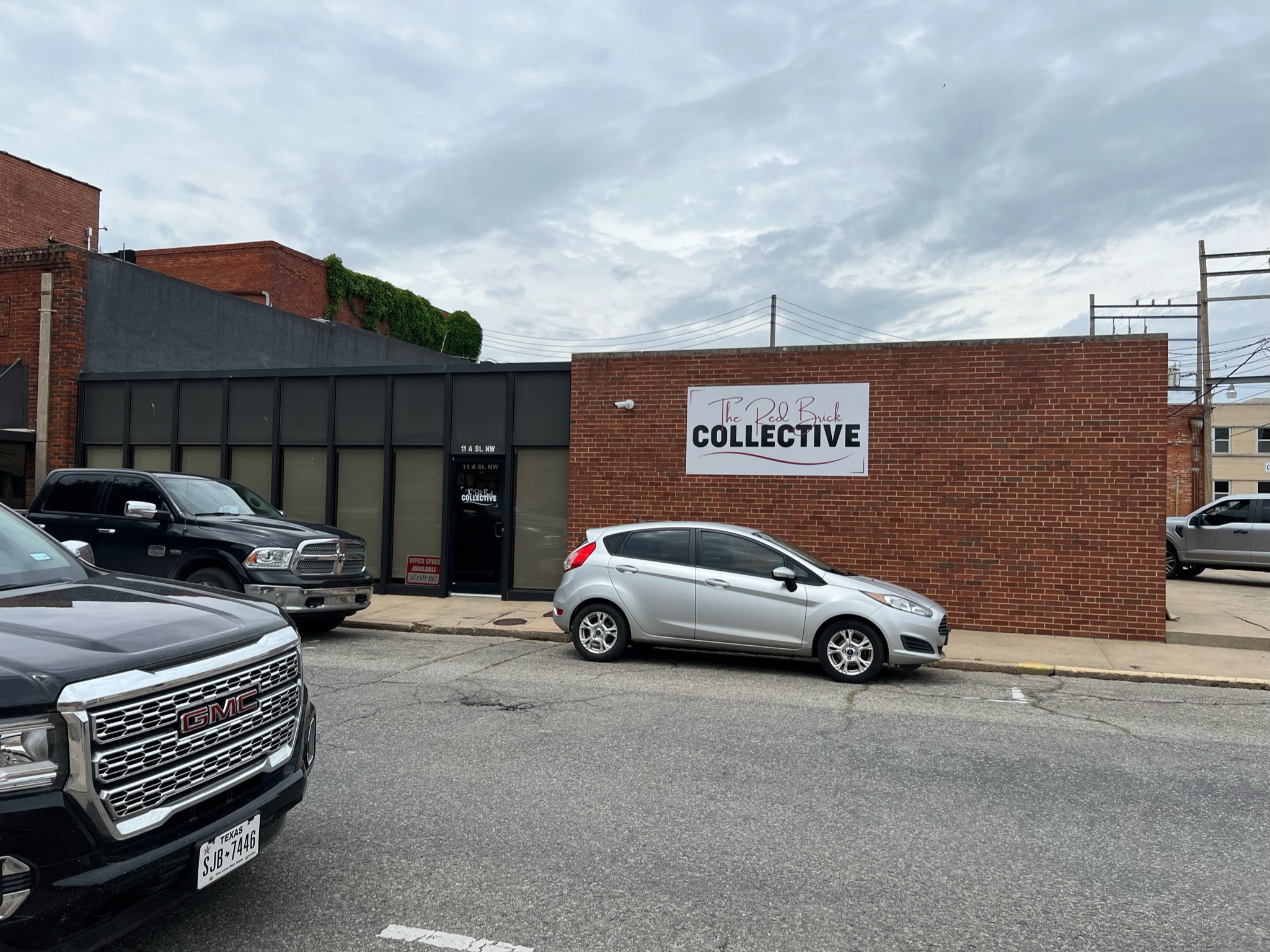 Red Brick collective sign - Hunter Graphix